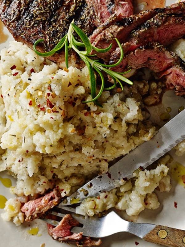 Grilled mutton steaks with rosemary cauliflower mash